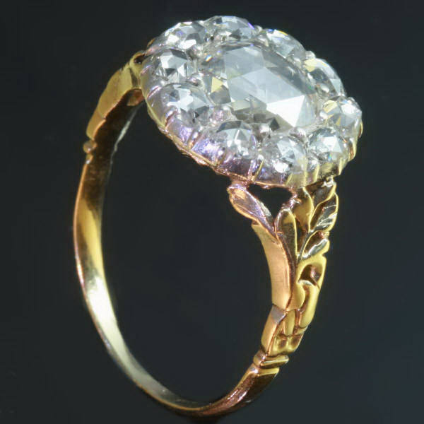 Antique engagement ring with big rose cut diamond engird by smaller ...