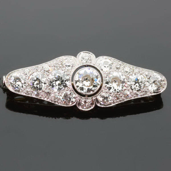 Vintage diamond platinum pin brooch: Description by Adin Antique Jewelry.