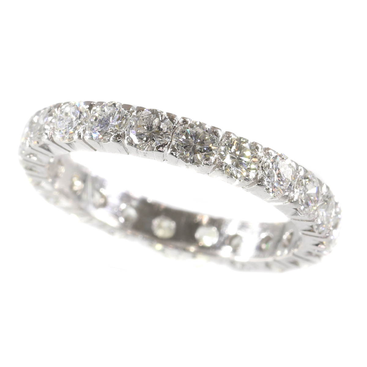 Estate diamond eternity band: Description by Adin Antique Jewelry.